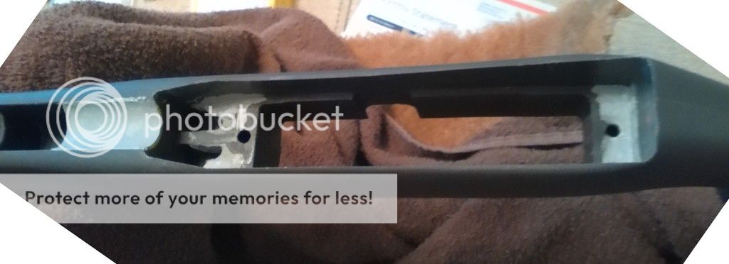 Action/Barrel teeter-tottering on the front stock mounting pad ...